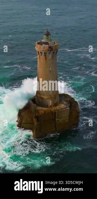 A rotating overhead shot of Phare du Four a lighthouse in Bretagne ...