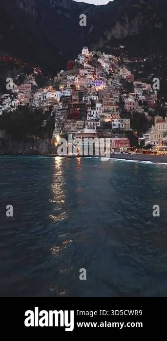 Aerial view of Positano. The famous colorful houses at night with light ...