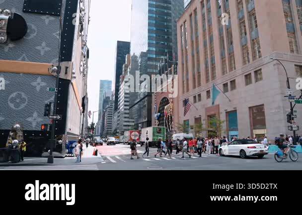 New York, USA, 1 August 2025: Crowded intersection on Fifth Avenue with ...