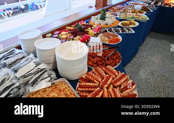 New York, USA, 1 August 2025: Long buffet table with assorted dishes on ...