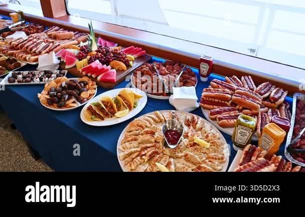 New York, USA, 1 August 2025: Long buffet table on a cruise ship with ...