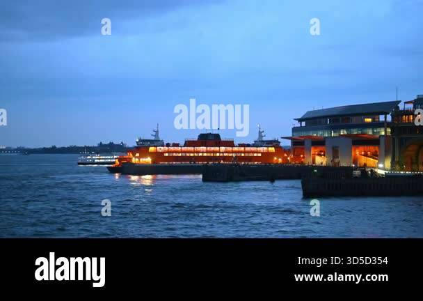 New York, USA, 1 August 2025: Staten Island Ferry terminal at night in ...