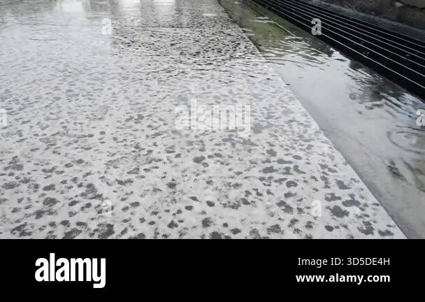 rain drops on the floor Stock Video Footage - Alamy