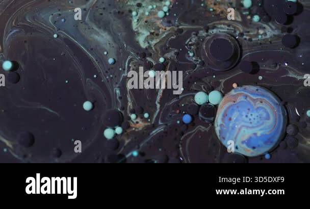 Bubble art. Ink water. Defocused blue orange color dark black purple ...