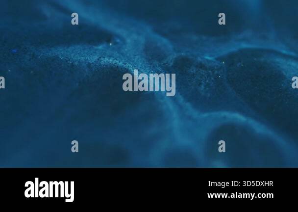 Ink grain. Shiny fluid. Blur blue color water texture dust sparkling ...