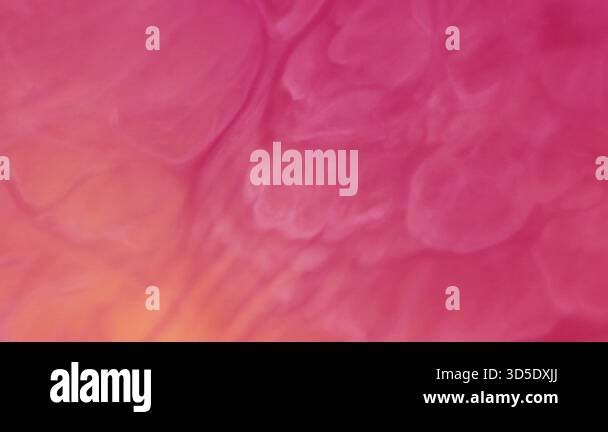 Blend emulsion. Mix splash. Defocused pink yellow red water ink liquid ...