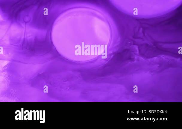 Neon round ink. Wet flow paint. Defocused purple lilac color water ...