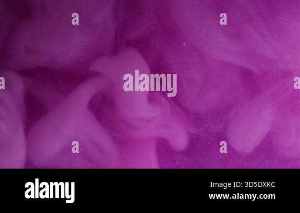 Shimmer ink. Glitter paint. Defocused lilac purple color water swirling ...