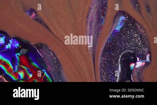 Ink drip. Color fluid. Defocused purple blue red water chemical texture ...