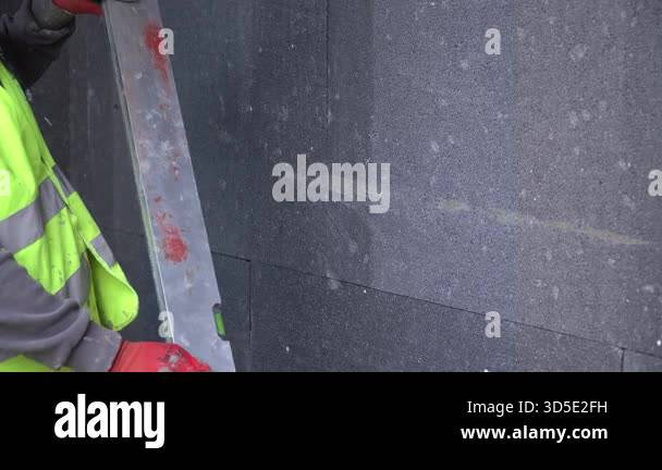 Workers installing polystyrene insulation Stock Videos & Footage - HD ...