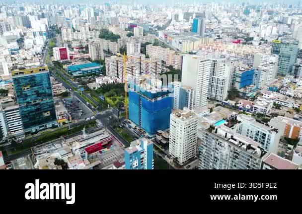 Construction in progress of a new building in Lima, Peru, aerial drone ...
