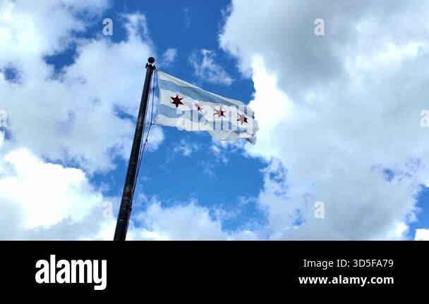 Chicago flag waving at wind at sky. Flag of Chicago city. Four stars ...