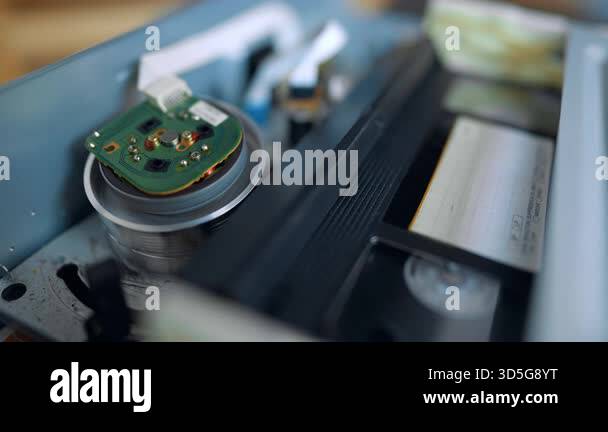 VHS cassette gets into the player and magnetic head starts reading it ...