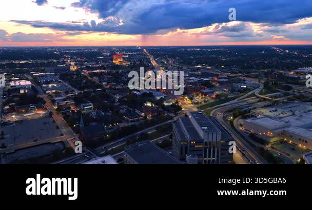 Vast panorama of Detroit in the evening. Dramatic cloudscape with rain ...