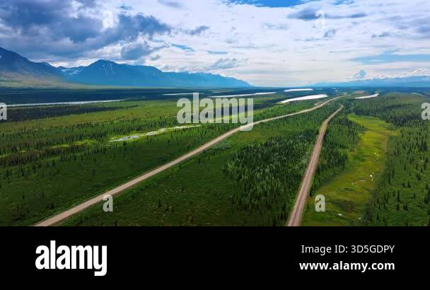 Roads and river in the beautiful vast valley among the mountains ...