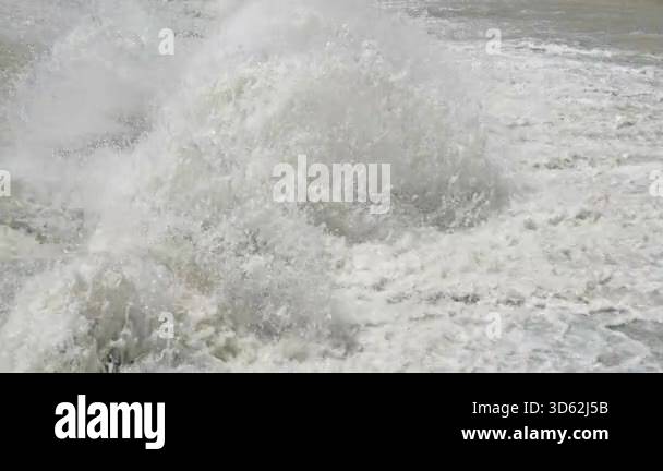 row of chute dentate blocks in concrete water spillway channel slope ...