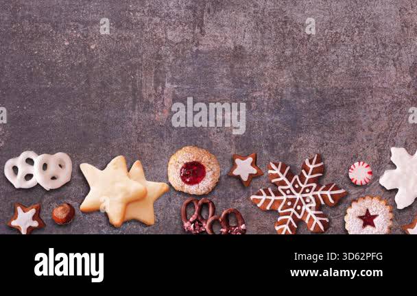 Christmas sweets moving bottom border. Above view, stop motion loop ...