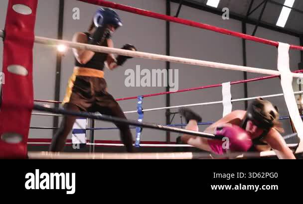 Quick jab sparking block, female boxers sparring in gym ring trading ...
