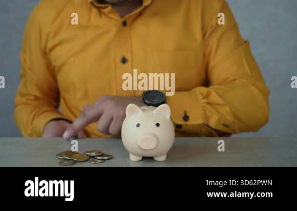 Man with piggy bank, counting coin. Financial crisis and money savings ...