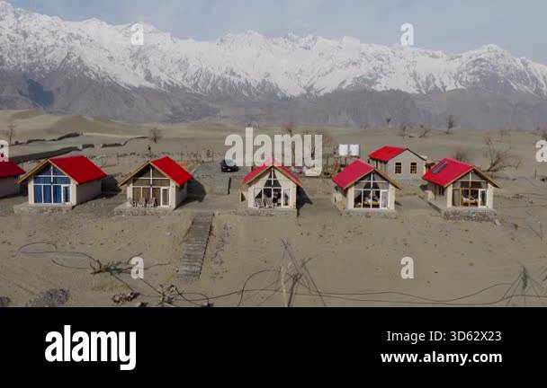 Aerial view of a quaint village in Pakistan, featuring charming cottage ...