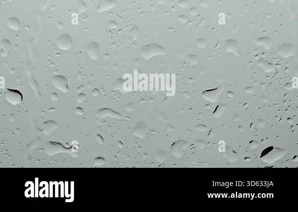 Rain drops on windshield. nature backgrounds and handhled shot Stock ...