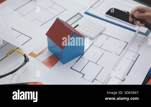 construction site with blueprint, building, architect and engineer ...