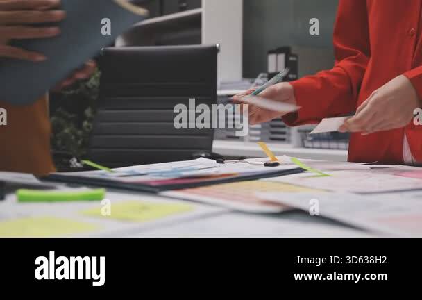 female engineer drawing on blueprint at office Stock Video Footage - Alamy