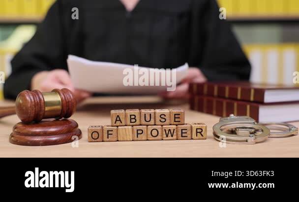 In a serious courtroom setting, a judge addresses the topic of abuse of ...