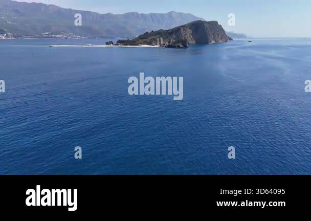 A beautiful view of the Adriatic Sea and cliffs in Budva, captured from ...