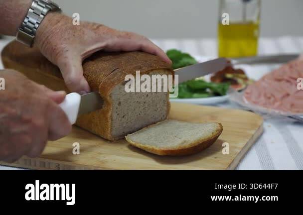 Preparing a delicious, nutritious and healthy sandwich with rye bread ...
