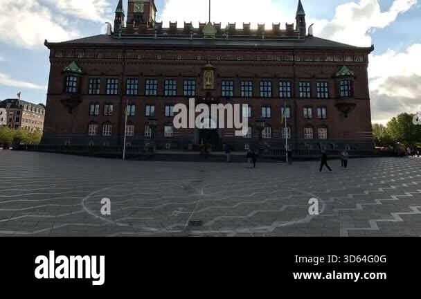 Urban scene in Copenhagen city centre captures Nyhavn canal lined with 17th century buildings ...