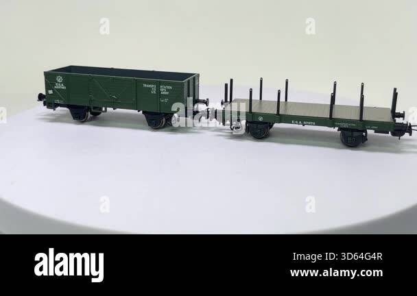 Two Tillig HO scale freight wagons together: 76715 open stake wagon and ...