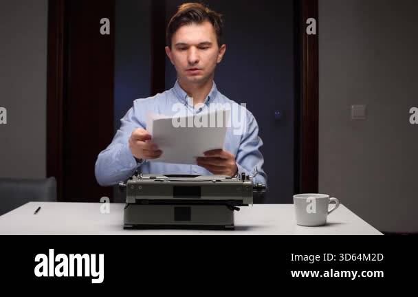 poet examines manuscript calmly, literary creator drafts with focused ...
