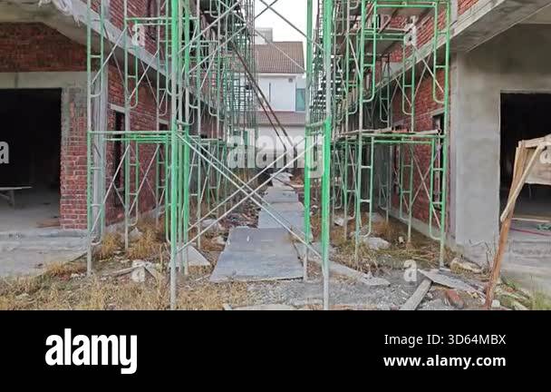 Scene of the temporary raised platform or scaffold for worker to stand ...