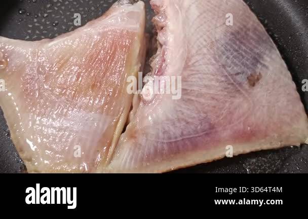 Fresh skate wings cooked in a pan Stock Video Footage - Alamy