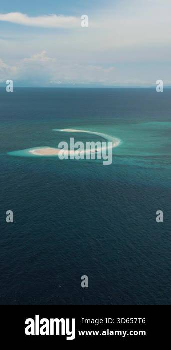 Top view of white sandbar with turquoise water in atoll. Camiguin ...