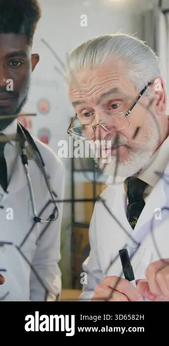 Medicine education concept where good-looking experienced senior ...