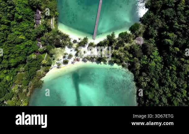 Discover Ko Ngam Beach in Koh Chang, Thailand, where crystal-clear ...