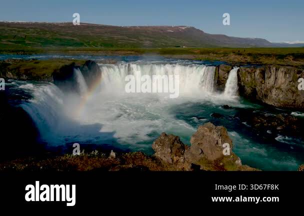 Witness the stunning cascade of Godafoss Waterfall, known as the ...