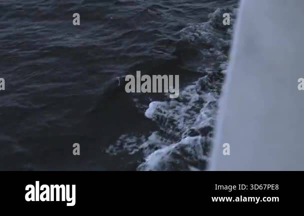 Waves splash from a moving boat on the Atlantic Ocean off Northern ...