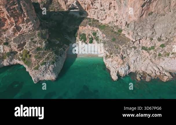 Top-down aerial view of Cala del Moraig cove and hidden beach ...