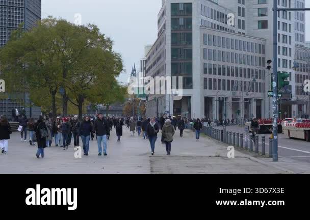 Germany Berlin November 9, 2025. Crowds stroll along Breitscheidplatz near the Memorial Church ...