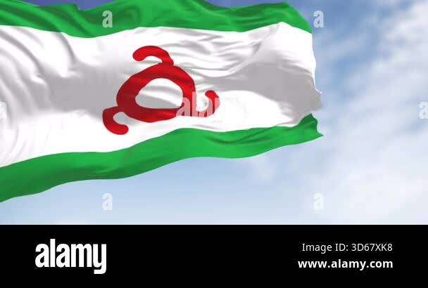 Ingushetia flag waving in the wind on a clear day. Republic and federal ...
