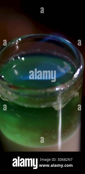 burns with a blue flame alcoholic drink Shot Bartender made some ...