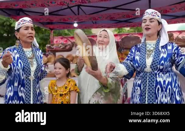 Samarkand, UZBEKISTAN - May 23, 2025: A group of Uzbek performers ...