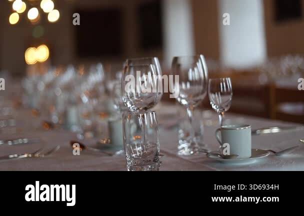 Interior of a medieval castle banquet hall with long wooden tables ...
