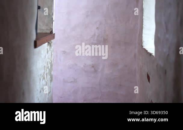 Interior of ancient castle rooms with stone walls, wooden furniture ...