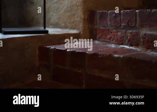 Interior of ancient castle rooms with stone walls, wooden furniture ...