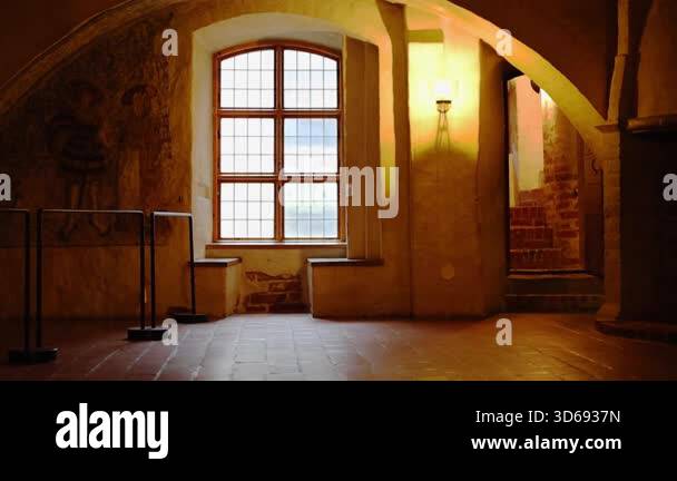 Interior of ancient castle rooms with stone walls, wooden furniture ...