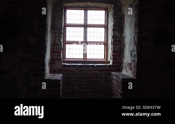 Interior of ancient castle rooms with stone walls, wooden furniture ...